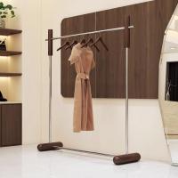 China Clothing Store Floor Middle Island Rack Stainless Steel Bright Hanger Walnut Display Prop for sale