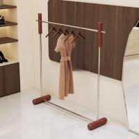 China Clothing Store Floor Middle Island Rack Stainless Steel Bright Hanger Walnut Display Prop for sale
