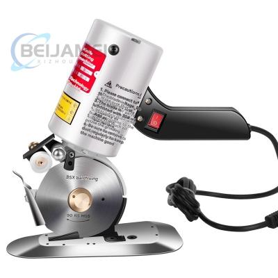 China Clothing Electric Scissors Cloth Cutter Fabric Cutting Machine Leather, Fabric, Paper, Handheld Cutting Machine for sale