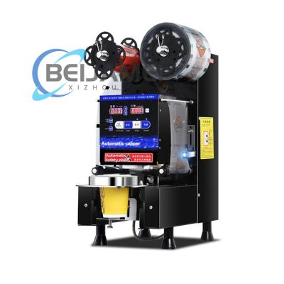 China Commercial Intelligent High-speed Fully Automatic Milk Tea Beverage 90~95mm Cup Sealing Machine for sale