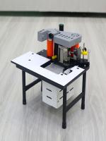 China 1200W Portable Edge Banding Machine - 220V, 0.3-3mm Thickness, Double-Sided for Home Furniture & Woodworking for sale