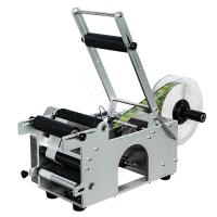 China Small Desktop Manual Round Bottle Labeling Machine Semi-Auto Adhesive Labeler for Glass Plastic Bottles for sale