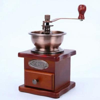 China Small Exquisite and Compact Bean Grinder Household Wooden Hand Cranked Coffee Grinder Grinding Adjustable Thickness for sale