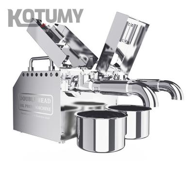 China Small Coconut Oil Extraction Machine Double Head  Vegetable Seeds Oil Pressers for sale