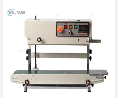 China Vertical Continuous Sealing Machine, Suitable For Kraft Paper And Aluminum Foil Bags, With Date Display Function for sale