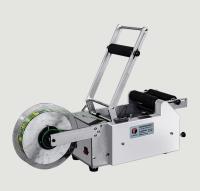 China Semi-Auto Small Desktop Labeling Machine Manual Round Bottle Labeling for Glass Plastic Bottles for sale