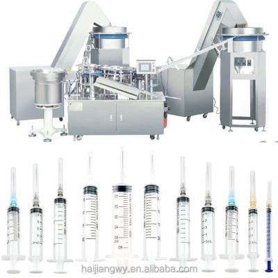 China Air Pressure 0.6-0.8Mpa Syringe Making Machine with Dimension 3000*1200*1800mm for sale