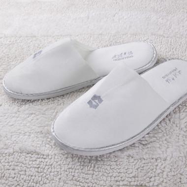 China Waffle Weave Embroidered Closed Toe Hotel Slippers Disposable Towelling Slippers for sale