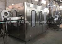 China Automatic Bottle Filling Machine 500ml 6000BPH Three-in-One Rinsing Filling Capping for sale
