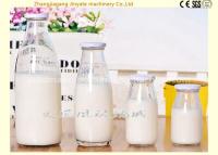 China Negative Pressure 3KW 4000BPH Milk Bottle Packing Machine for sale