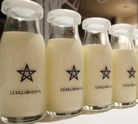 China Glass Bottled Automatic Milk Filling Machine 18 Heads 6000 BPH Vacuum Negative Pressure Filling for sale