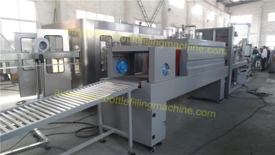 China Semi Automatic PE Film Heat Shrink Wrapping Machine 220V 1.8KW with Steam Generator for Bottles Cans for sale