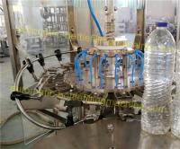 China PET Bottle Mineral Water Filling Machine 4000BPH Tri-Block Rinser Filler Capper for sale