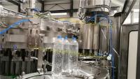 China Automatic 3 in 1 Carbonated Drink Filling Machine 12000BPH Soda Bottle Filler Capper for sale