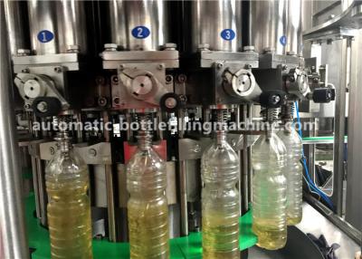 China 3.5Kw Rotary Sealing Sunflower Auto Oil Filling Machine 5000BPH 24 Head for sale