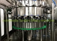 China Automatic Carbonated Beverage Filling Machine 250ml-2L 6000 BPH 3-in-1 Monoblock for sale