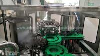 China Glass Bottle Filling and Capping Machine 6000BPH 500ml Twist Off Cap Filler for sale