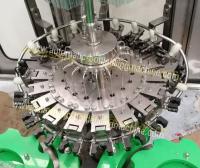 China Twist Off Cap Glass Bottle Filling and Capping Machine 6000 BPH Small Scale Filler for sale