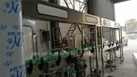 China Automatic Juice Flavor Glass Bottle Filling Machine 4000-6000 BPH Water Bottling Line for sale