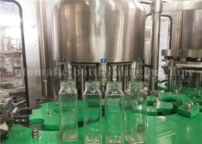 China ISO Small Glass Bottle Filling Machine 2000BPH for Fruit Pulp Juice and Coconut Milk for sale