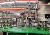 China 4000BPH Carbonated Beverage Glass Bottle Filling Machine for Sparkling Water Coke Cola 18-18-6 for sale