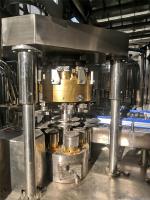 China 33cl Beverage Can Filling Machine Mango Lemon Juice Rotary Canning Line 4000-6000 Cans Per Hour for sale