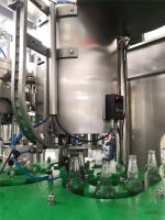 China 8000BPH 32 Heads CSD Glass Bottle Soda Filling Machine with PLC Control for sale