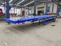 China 3 Axle Flatbed Semi Trailer Customized  20 Ft 40 Ft For Container Carrying 50-60 Tons for sale