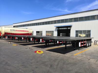 China Flat Bed Semi Trailer with 12 R22.5 Radial Tires 40-60t Load Capacity and 3 Axles for Heavy Duty Transport for sale