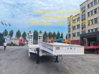 China HEAVY DUTY TRI-AXLE FLATBED SEMI TRAILER EQUIPPED WITH GENUINE FUWA AXLES AND 12R22.5 TIRES FOR 40FT CONTAINER TRANSPORTATION for sale