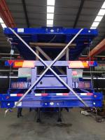 China Overall Dimension 12500mm 2500mm 1530mm Flat Bed Semi Trailer Equipped with 12 Wheels Transporting Large Heavy Goods for sale