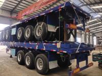 China Overall Dimension 12500mm 2500mm 1530mm Flat Bed Semi Trailer Equipped with 12 Wheels Transporting Large Heavy Goods for sale