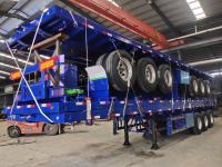 China Overall Dimension 12500mm 2500mm 1530mm Flat Bed Semi Trailer Equipped with 12 Wheels Transporting Large Heavy Goods for sale