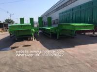 China SINOTERCEL 13m 60Ton Widening Low Bed Semi-Trailer with Hydraulic Ramp for sale