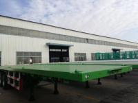 China 3 Axles Flat Bed Semi Trailer Demission Of Flat 12500 2500 1600mm Durable Trailer Designed For Safe And Freight Hauling for sale