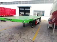 China 3 Axles Flat Bed Semi Trailer Demission Of Flat 12500 2500 1600mm Durable Trailer Designed For Safe And Freight Hauling for sale