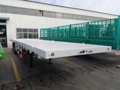 China Customizable semi truck flatbed trailer demission of flat 12500x2500x1600mm engineered for secure and heavy load hauling for sale