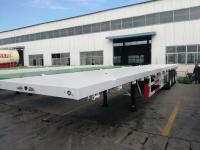 China Customizable semi truck flatbed trailer demission of flat 12500x2500x1600mm engineered for secure and heavy load hauling for sale
