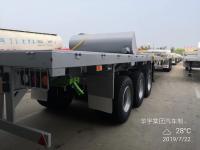 China Load 20ft 40ft Container Trailer Flat Bed Semi Trailer Including 1 Standard Tool Box and 3.5in JOST King Pin Ideal for Freight Hauling for sale