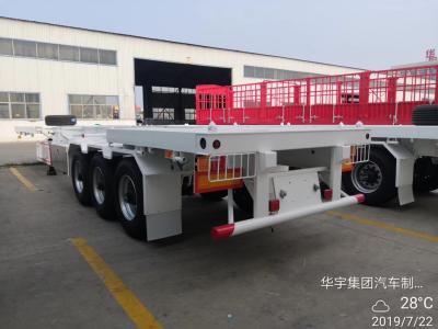 China Load 20ft 40ft Container Trailer Flat Bed Semi Trailer Including 1 Standard Tool Box and 3.5in JOST King Pin Ideal for Freight Hauling for sale