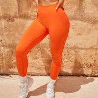 China Hot selling seamless yoga set knitted solid color Training Wear high waist pants women sports leggings fitness clothing for sale