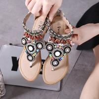 China Summer new fashion ethnic style flat sandals hot selling Bohemian comfortable light slippers hollow women shoes for sale