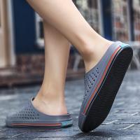 China New design couple hole casual shoes summer sandals women breathable flat non-slip Men beach hollow lazy half slippers for sale