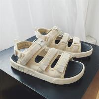 China 2022 new design couple summer sandals women outdoor beach shoes soft sole magic paste slide slippers for Men for sale