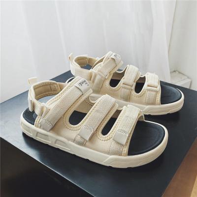 China 2022 new design couple summer sandals women outdoor beach shoes soft sole magic paste slide slippers for Men for sale