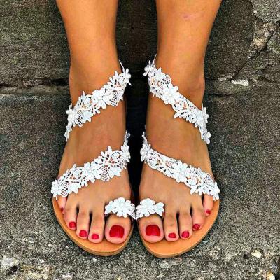 China 2022 fashion trend casual solid color sandals flat beach lightweight slippers for women and ladies floral sandals for sale