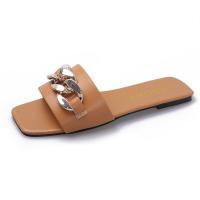 China New design summer flat bottom women cheap outdoor slippers fashion metal buckle retro non-slip sandals in stock for sale