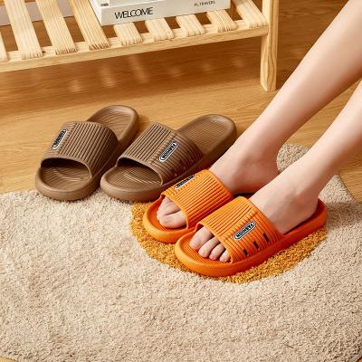 China 2022 new style letter slippers fashion irregular striped home indoor shoes non-slip couple summer sandals women for sale