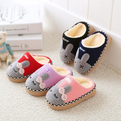 China Children slippers home warm cartoon smile rabbit winter non-slip thick bottom cute girls bedroom shoes in stock for sale