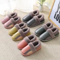 China Slippers women winter all-inclusive heel non-slip couple warm waterproof PU leather home indoor shoes for men for sale